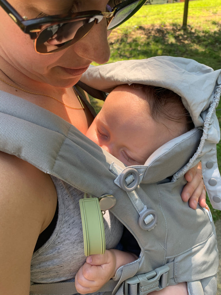 green pacifier holder